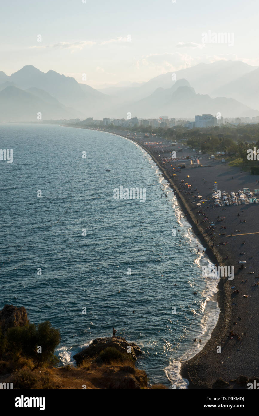 People swimming and sunbathing at beach in Antalya, Turkey Stock Photo ...