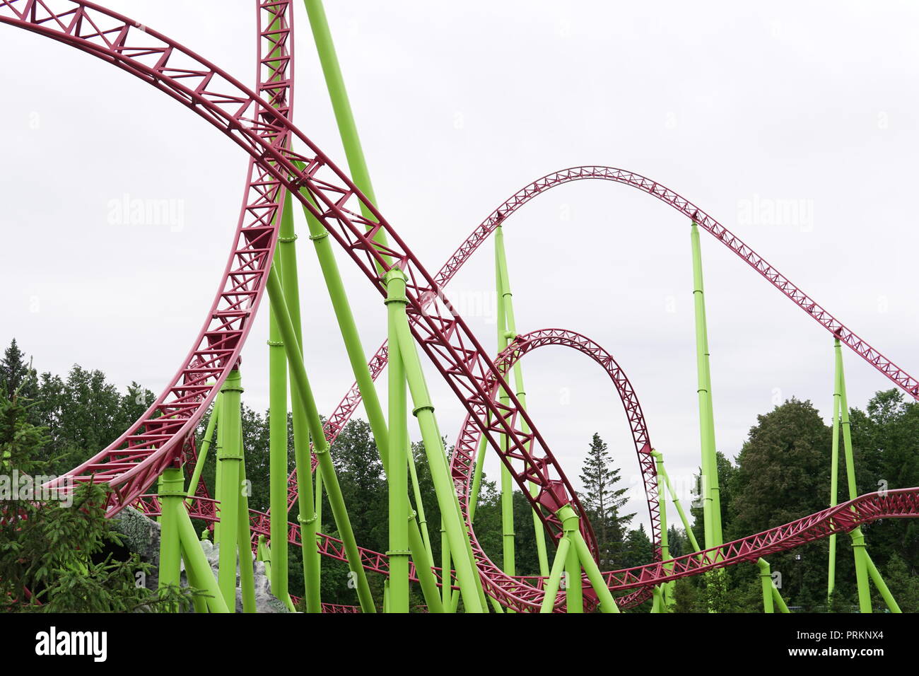 roller coaster attractions fun in the park for children Stock Photo - Alamy