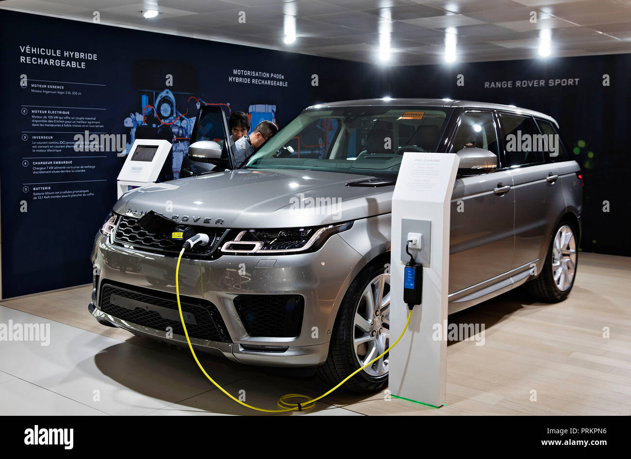 Range Rover Sport is being charged during the International Motor Show ...