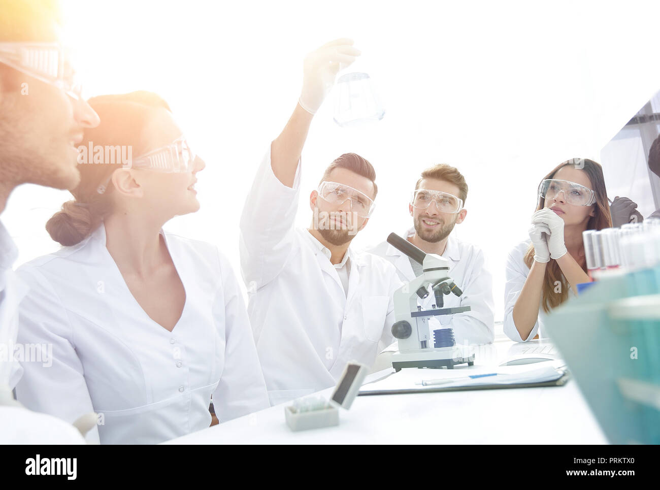group of young workers are working in biochemistry lab Stock Photo - Alamy