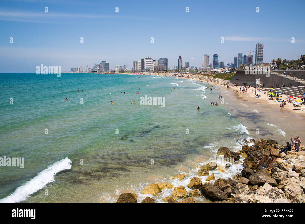 TEL AVIV, ISRAEL - JUNE 4, 2015: People relax on a beautiful beach in ...