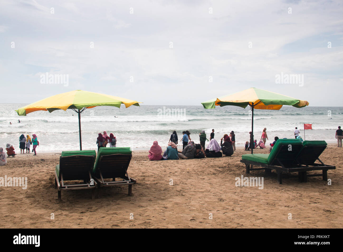 KUTA, BALI - JANUARY 2018: People and lots of garbage on Kuta beach in ...