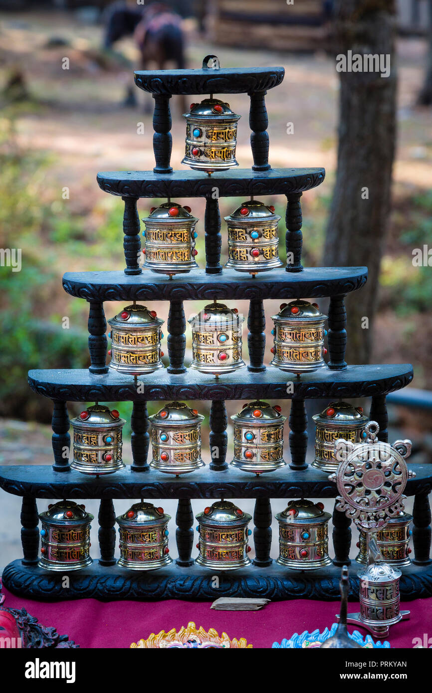 A pyramid made of prayer wheels for sale at the market in Paro in ...