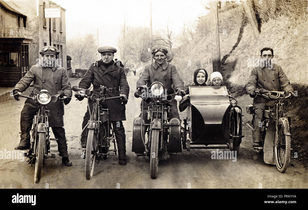 Posing for a photograph a line-up of four veteran motorcycles in the ...