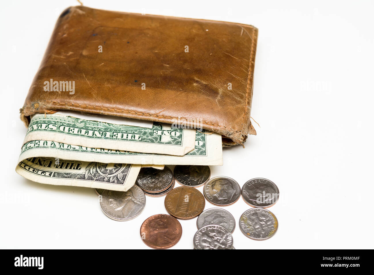 Old leather wallet with notes and money Stock Photo - Alamy
