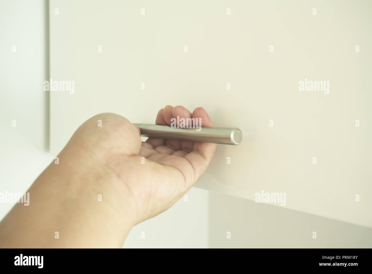 Kitchen cabinet handle hi-res stock photography and images - Alamy