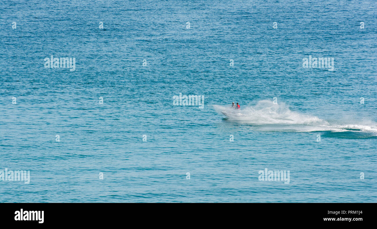 Jet Ski rides and hires at Newquay, Cornwall, the Jet Skis seen in blue ...