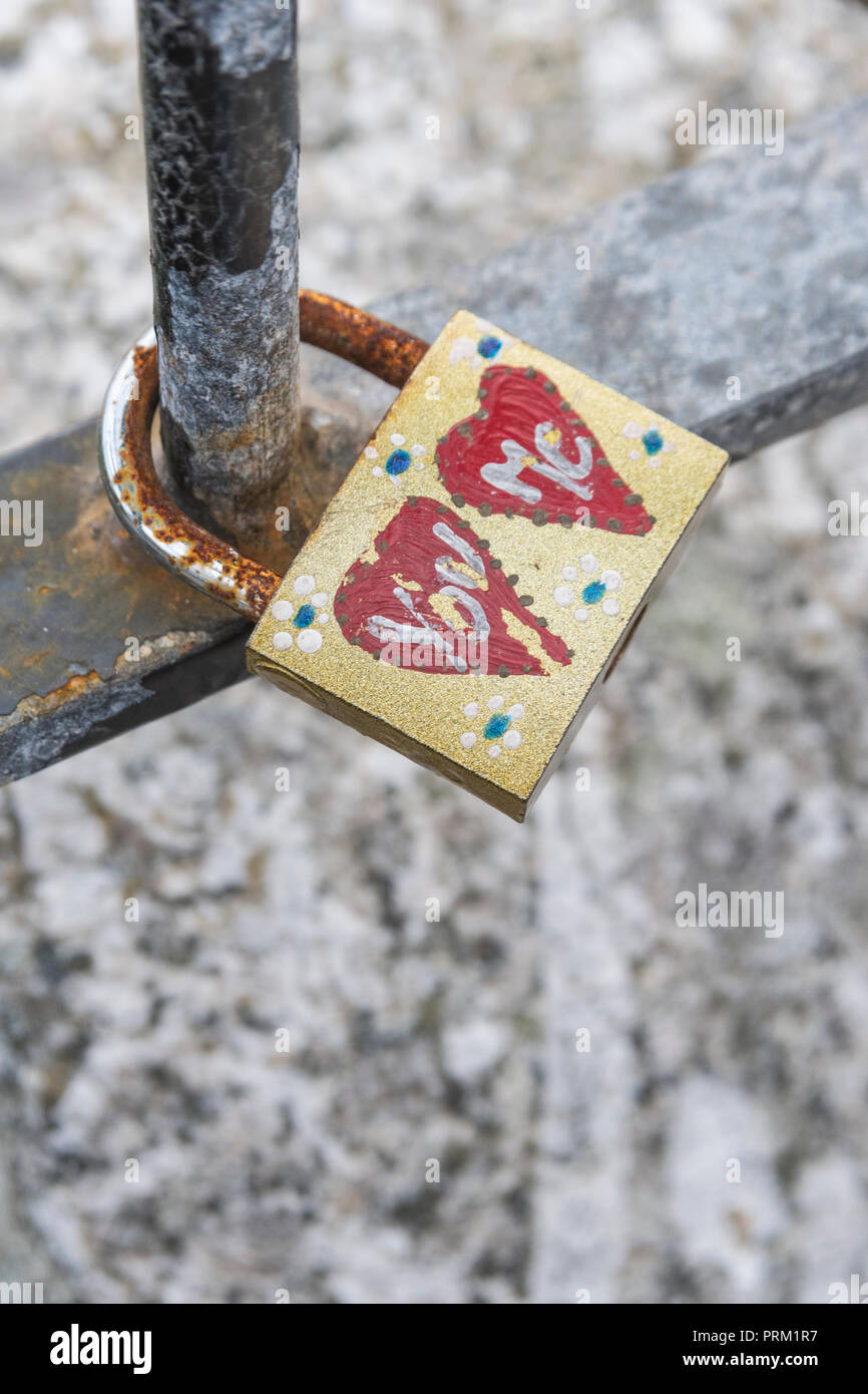 Padlock lovelock with You / Me, His and Hers hearts painted. Metaphor ...