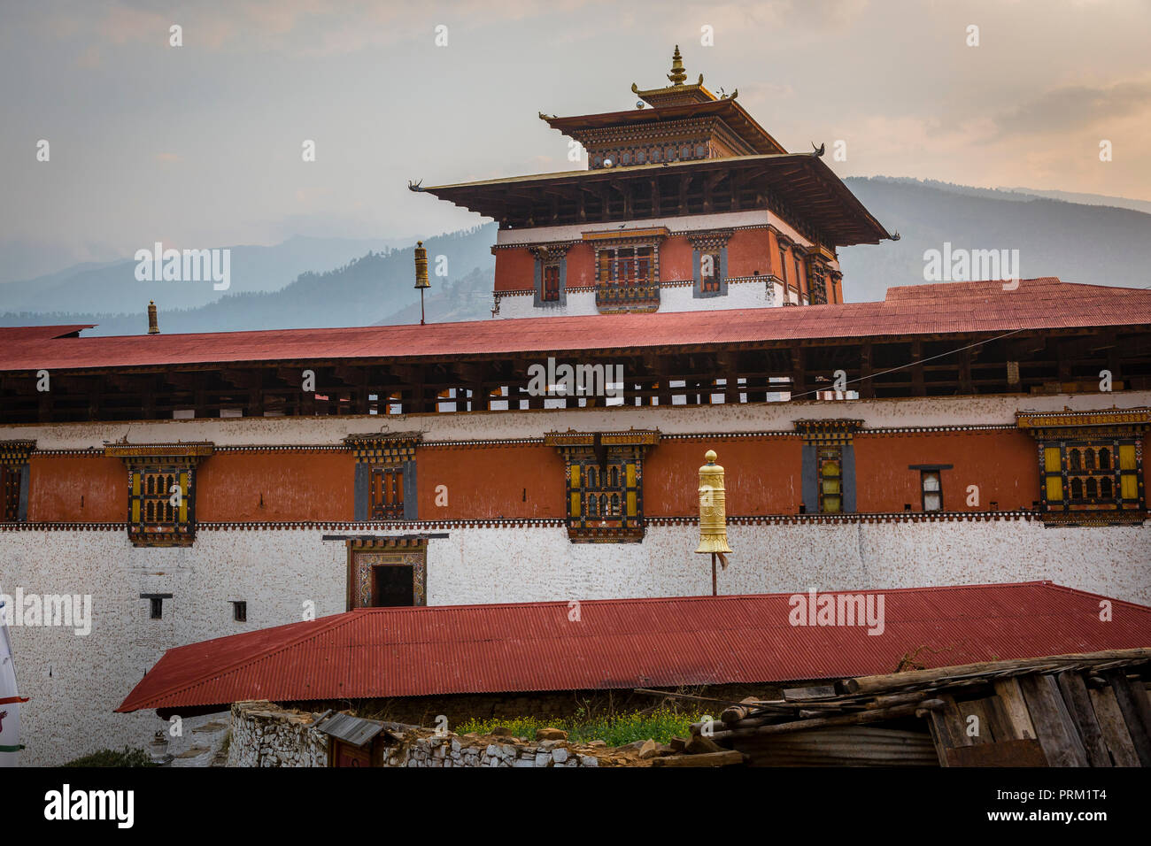 View of the complete building of Paro Dzong in the town of Paro in ...