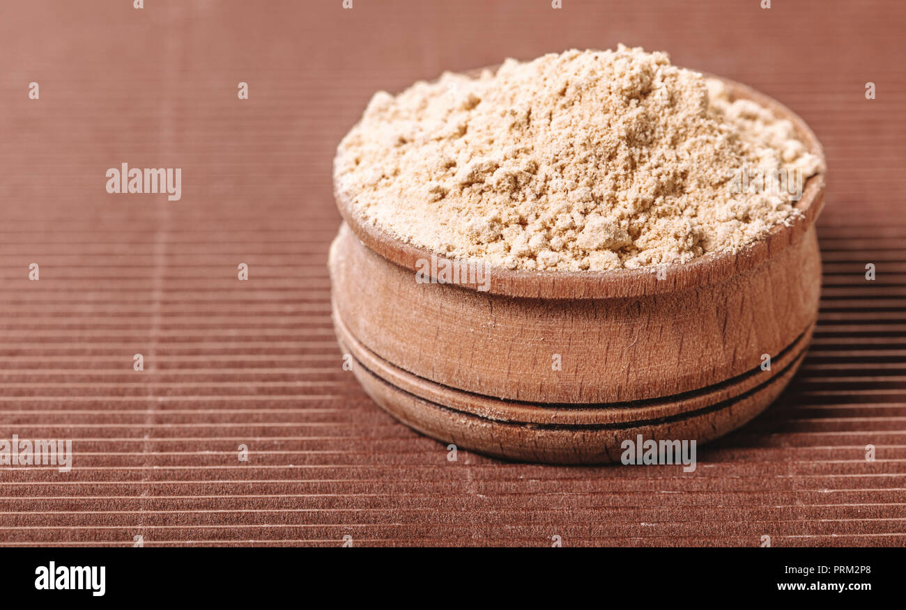 Ground ginger in bowl closeup hi-res stock photography and images - Alamy
