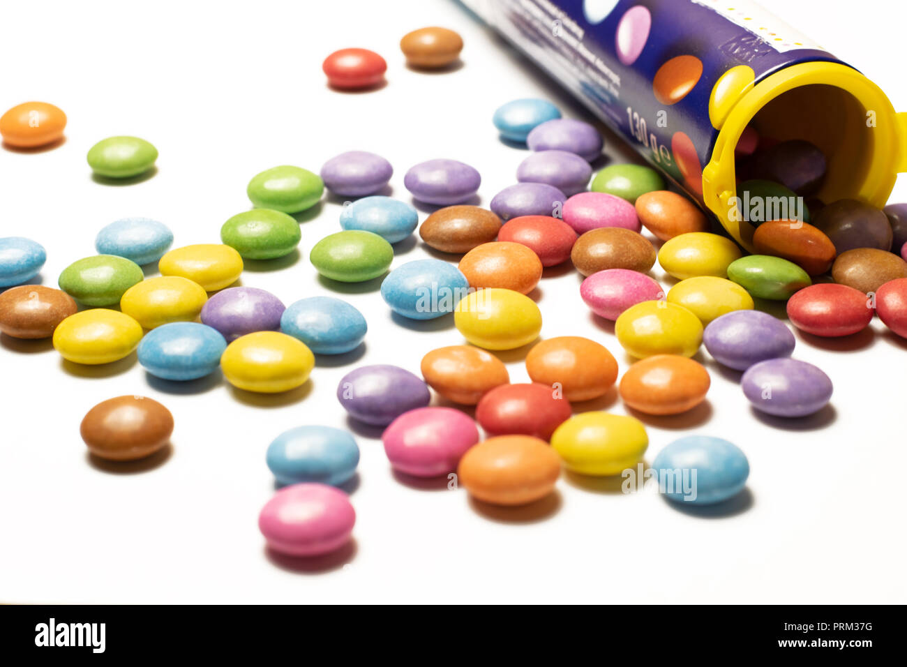 candy chocolate cubes on white background Stock Photo - Alamy