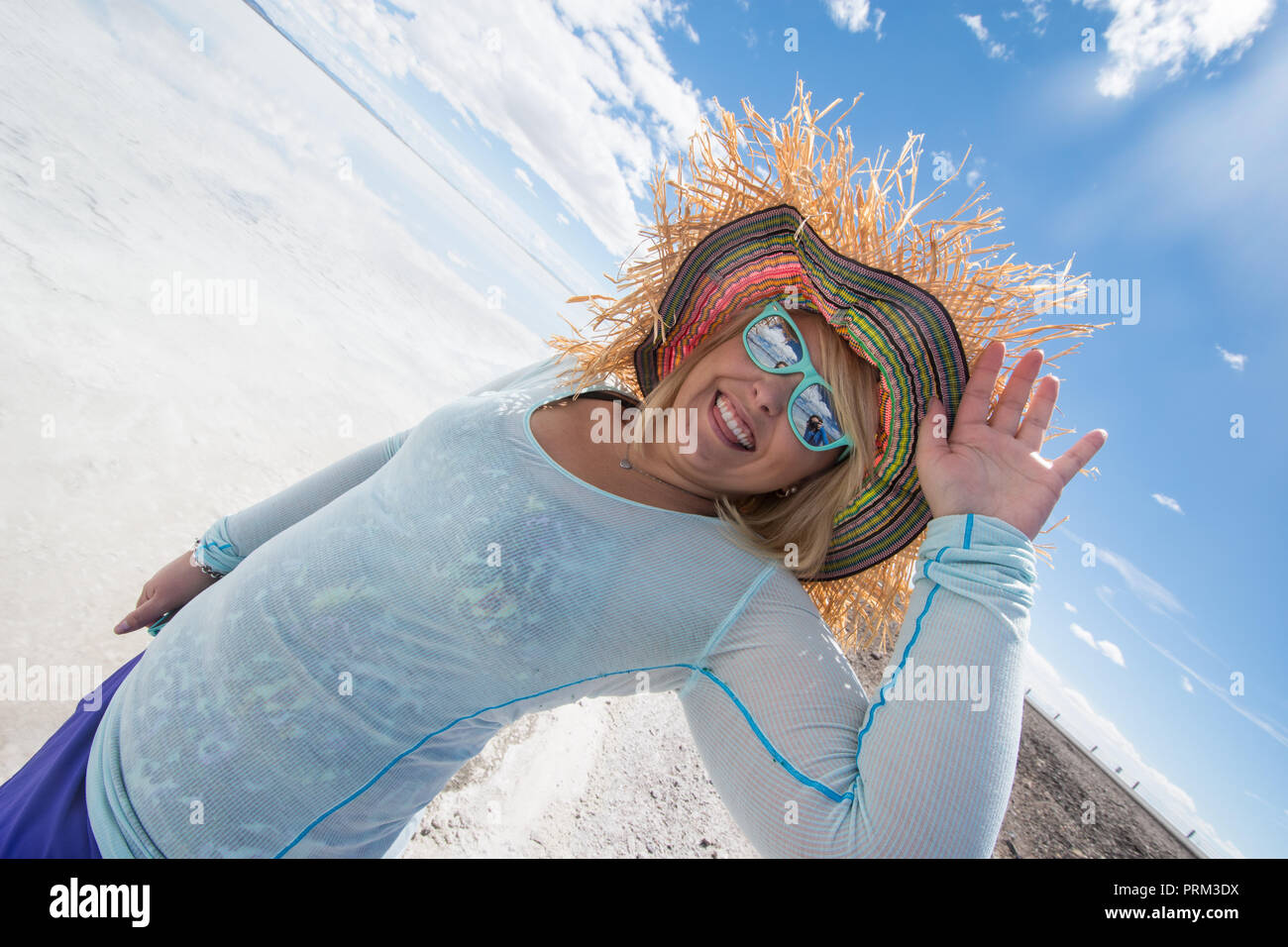 An adult female wearing a straw hat wanders around at the Bonneville ...