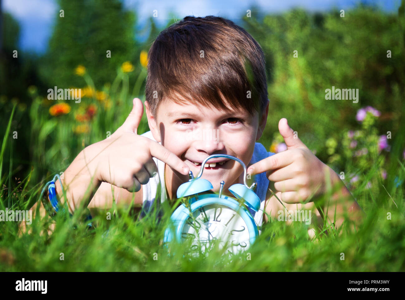 Boy Showing Clock High Resolution Stock Photography and Images - Alamy