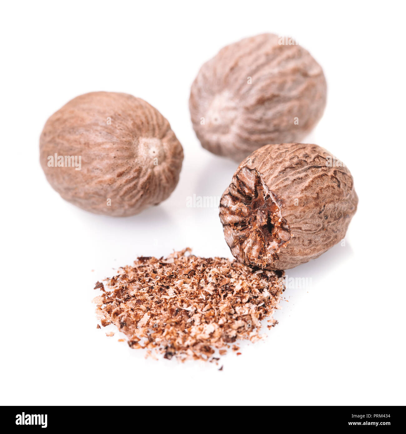 spices nutmeg closeup on white isolated background Stock Photo - Alamy
