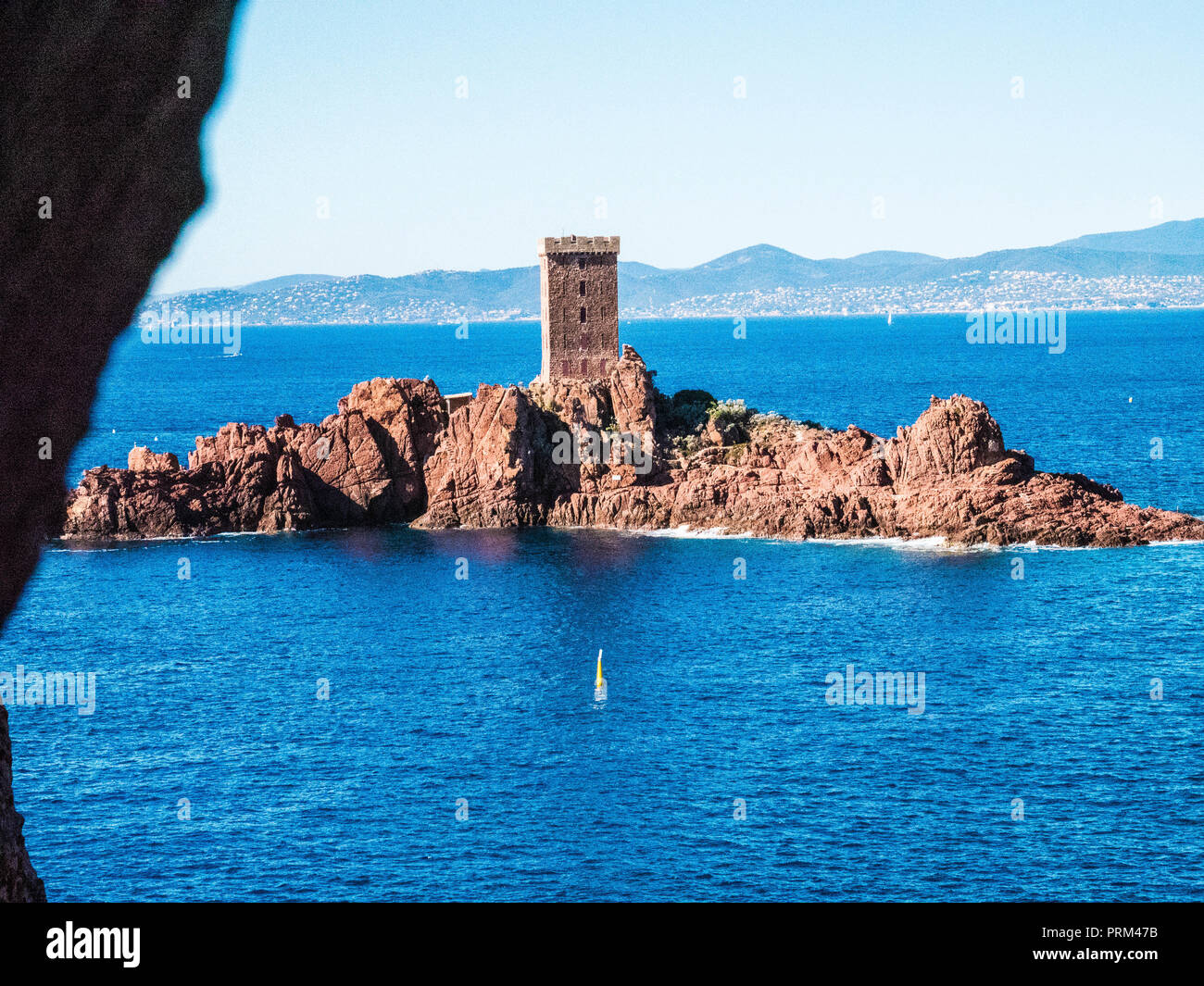 Tower on a little island in the mediterranean sea Stock Photo - Alamy