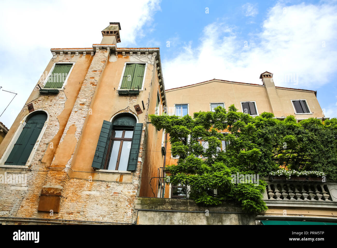 Historic architecture with old medieval buildings in Venice, Italy ...