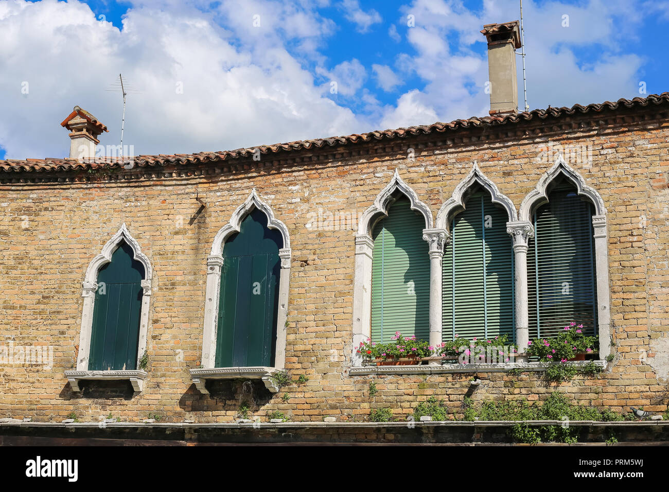 Historic architecture with old medieval buildings in Venice, Italy ...