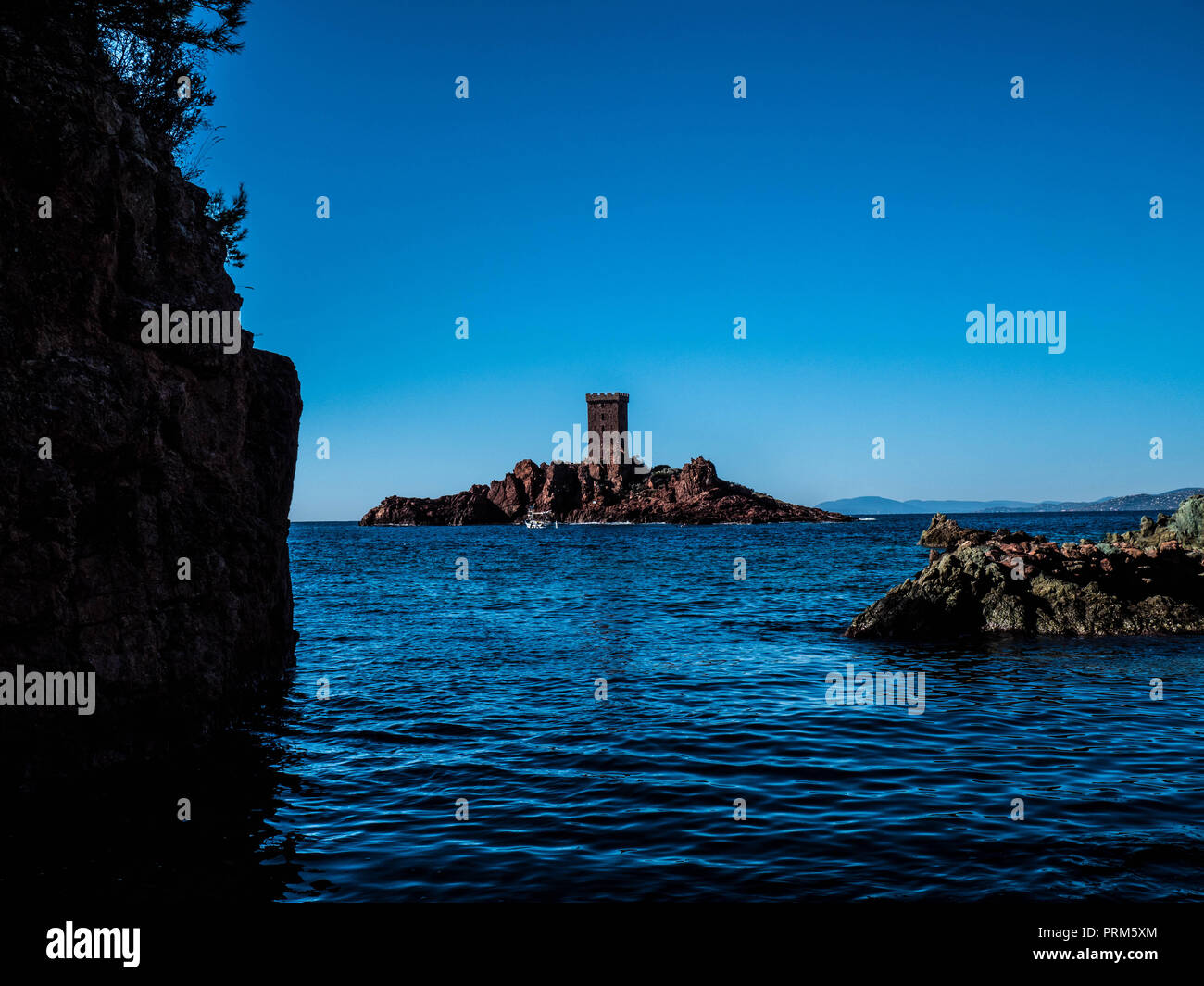Tower on a little island in the mediterranean sea Stock Photo - Alamy