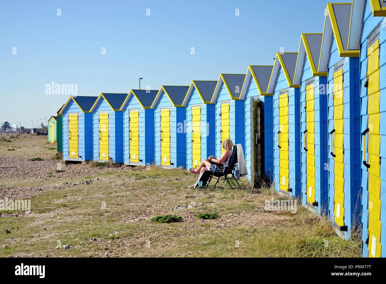 Colourful modern beach huts on the seafront at Littlehampton west ...