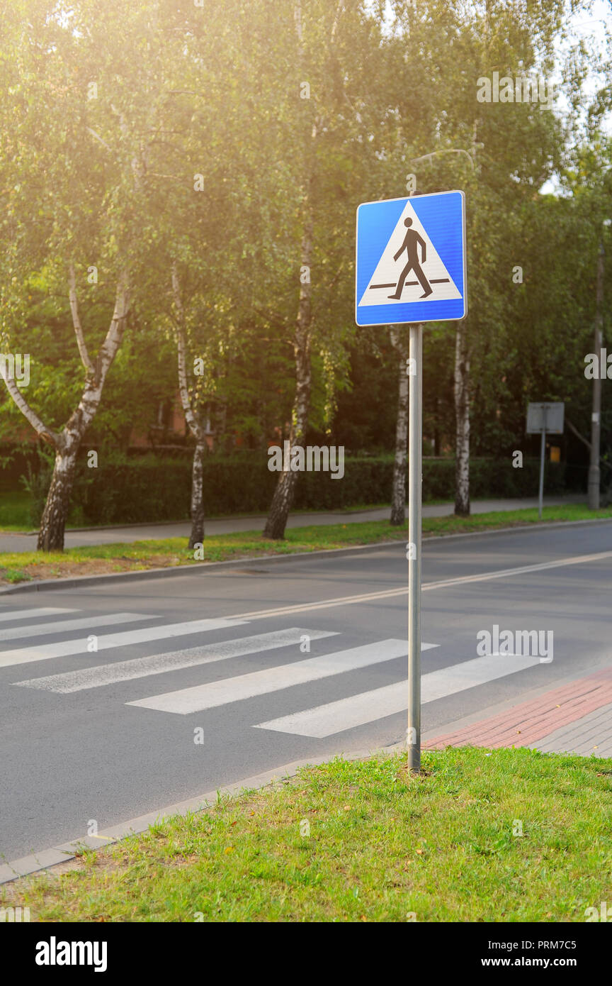 Crosswalk or zebra crossing and street sign Stock Photo - Alamy