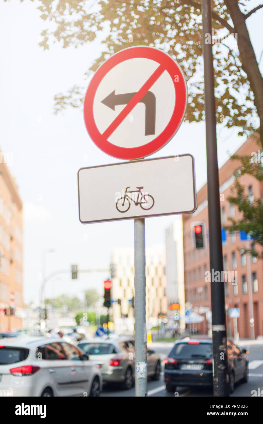 Road sign No left turn on the street Stock Photo - Alamy