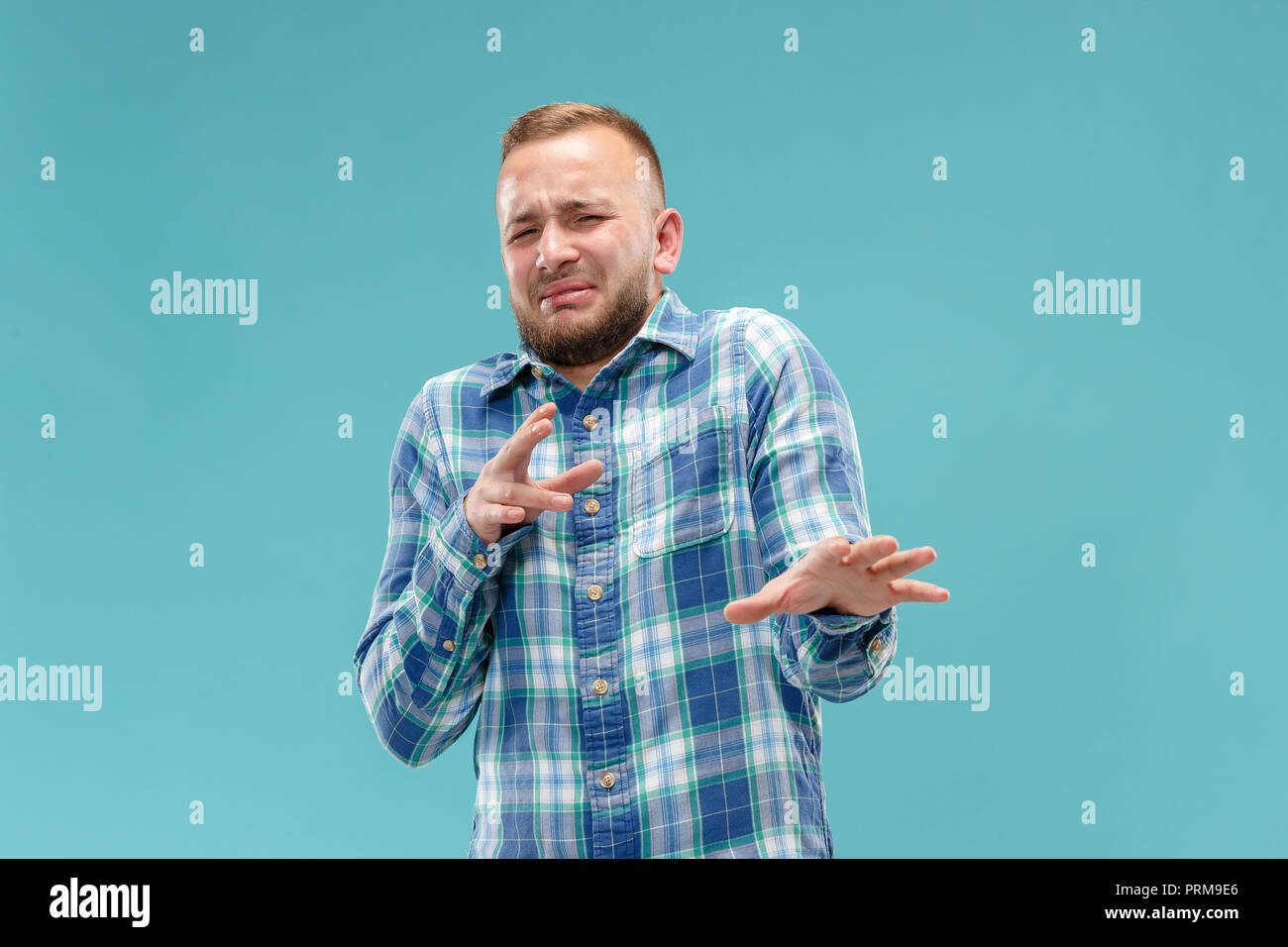 Reject, rejection, doubt concept. Young emotional man at studio. Human ...