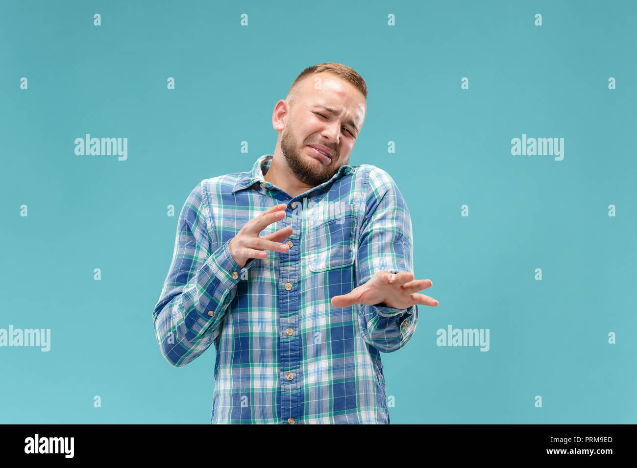 Reject, rejection, doubt concept. Young emotional man at studio. Human ...