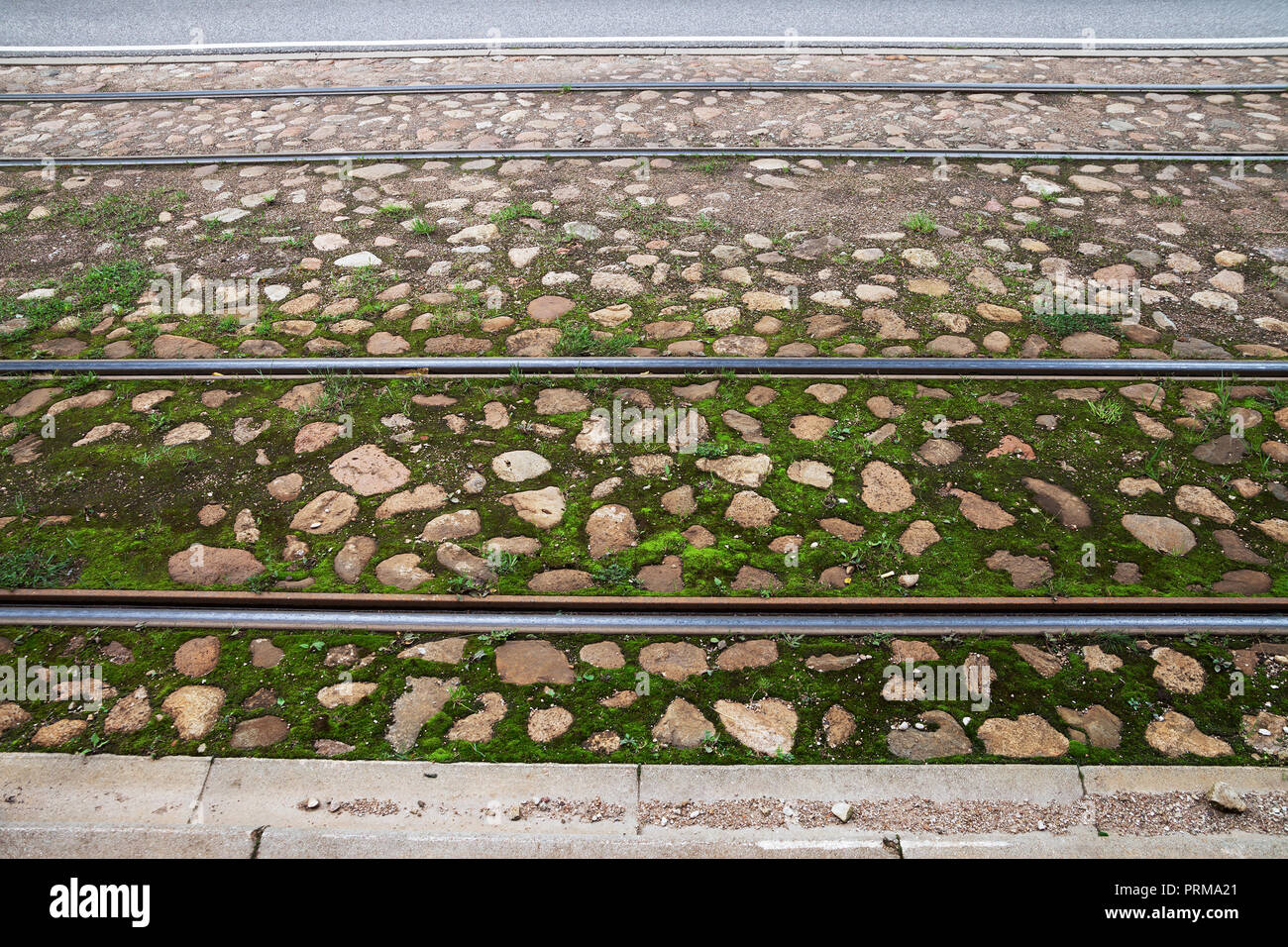 Tram rail road in small city Stock Photo - Alamy