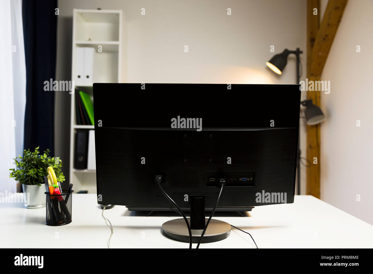Empty desk with computer in office Stock Photo - Alamy