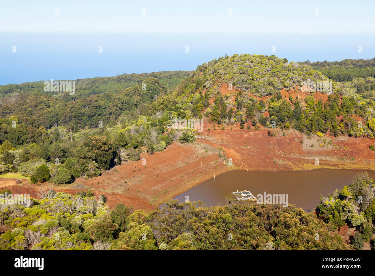 A reservoir lake in the west of the island seen from helicopter in ...