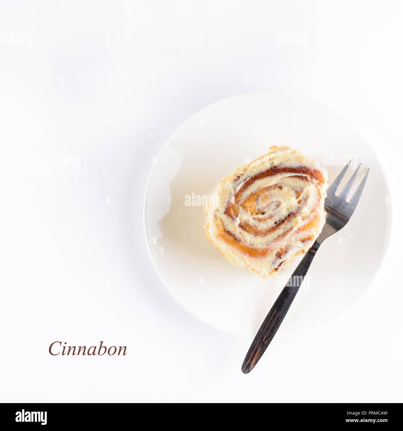 Fresh cinnabon roll with glaze on white background. Homemade cinnamon ...