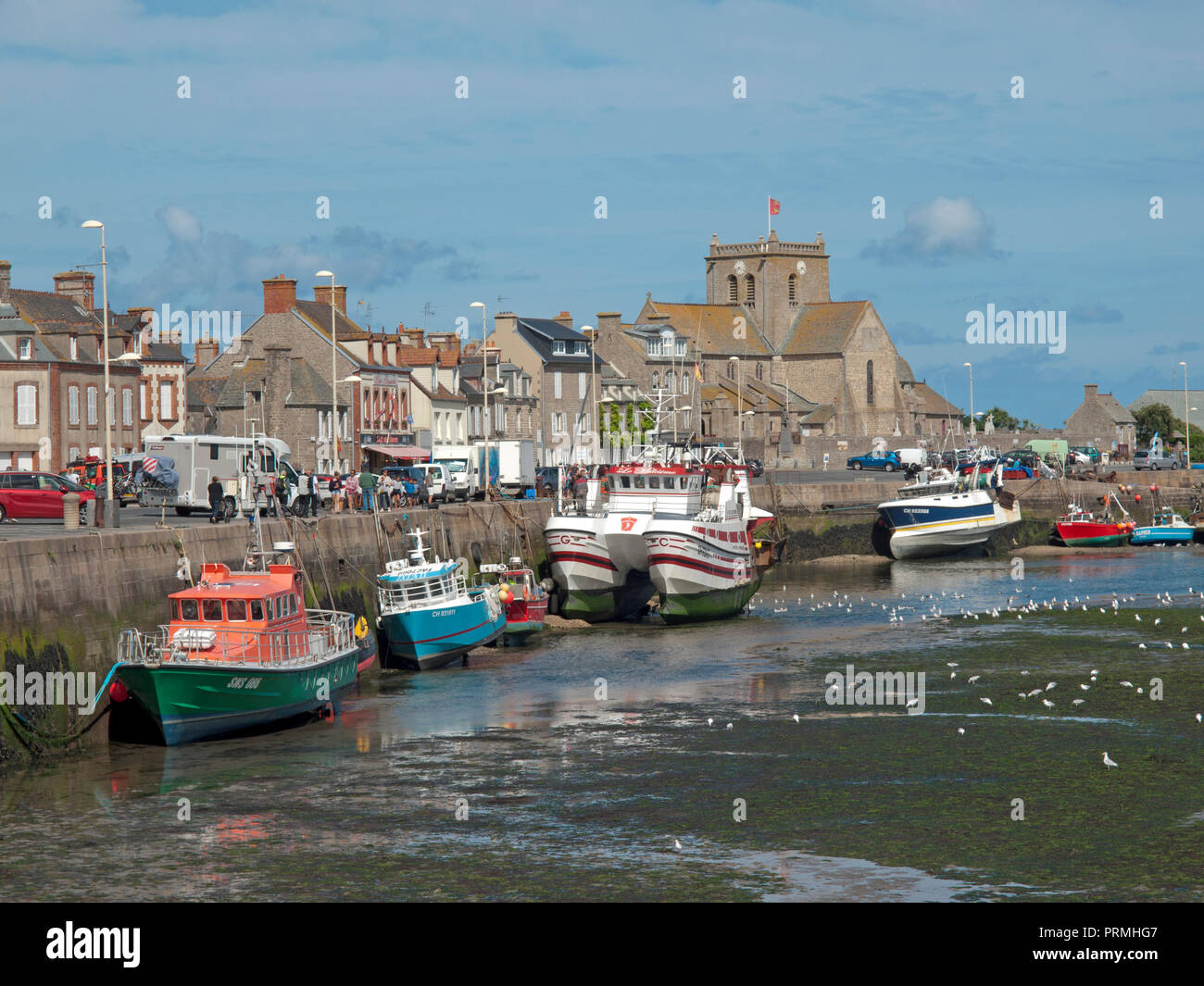 Low tide in the harbor of Barfleur, Normandy Stock Photo - Alamy