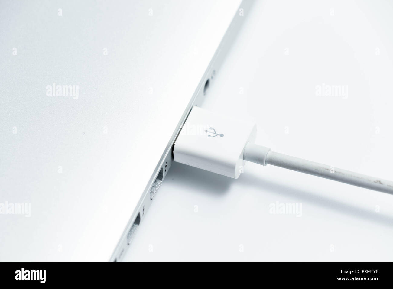 Macbook pro power cable hi-res stock photography and images - Alamy