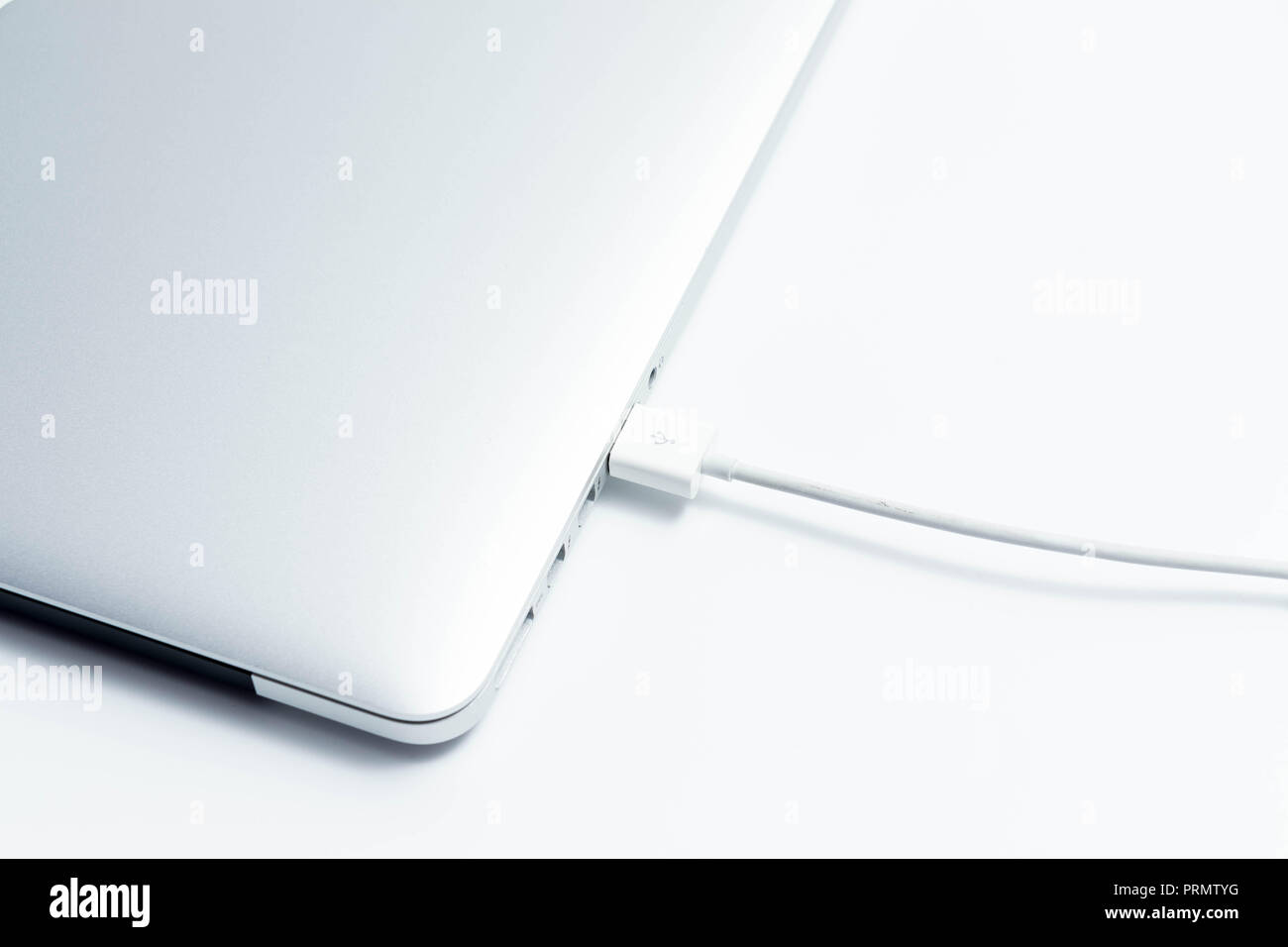 Macbook pro power cable hi-res stock photography and images - Alamy