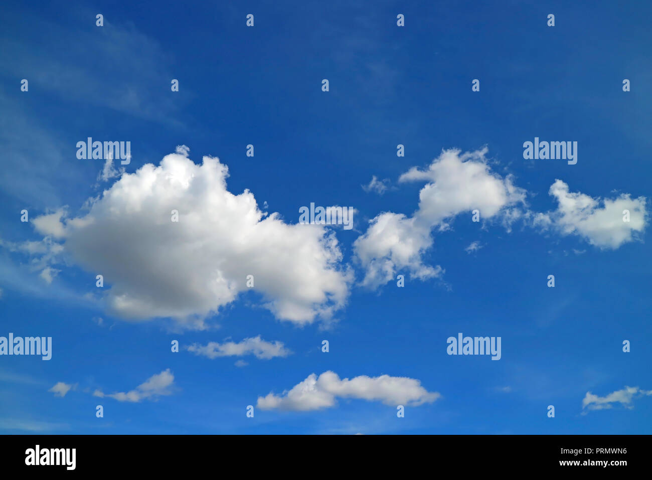 Pure White Fluffy Cumulus Clouds Floating on Vivid Blue Sky of Peru ... Pure White Fluffy Cumulus Clouds Floating on Vivid Blue Sky of Peru ...