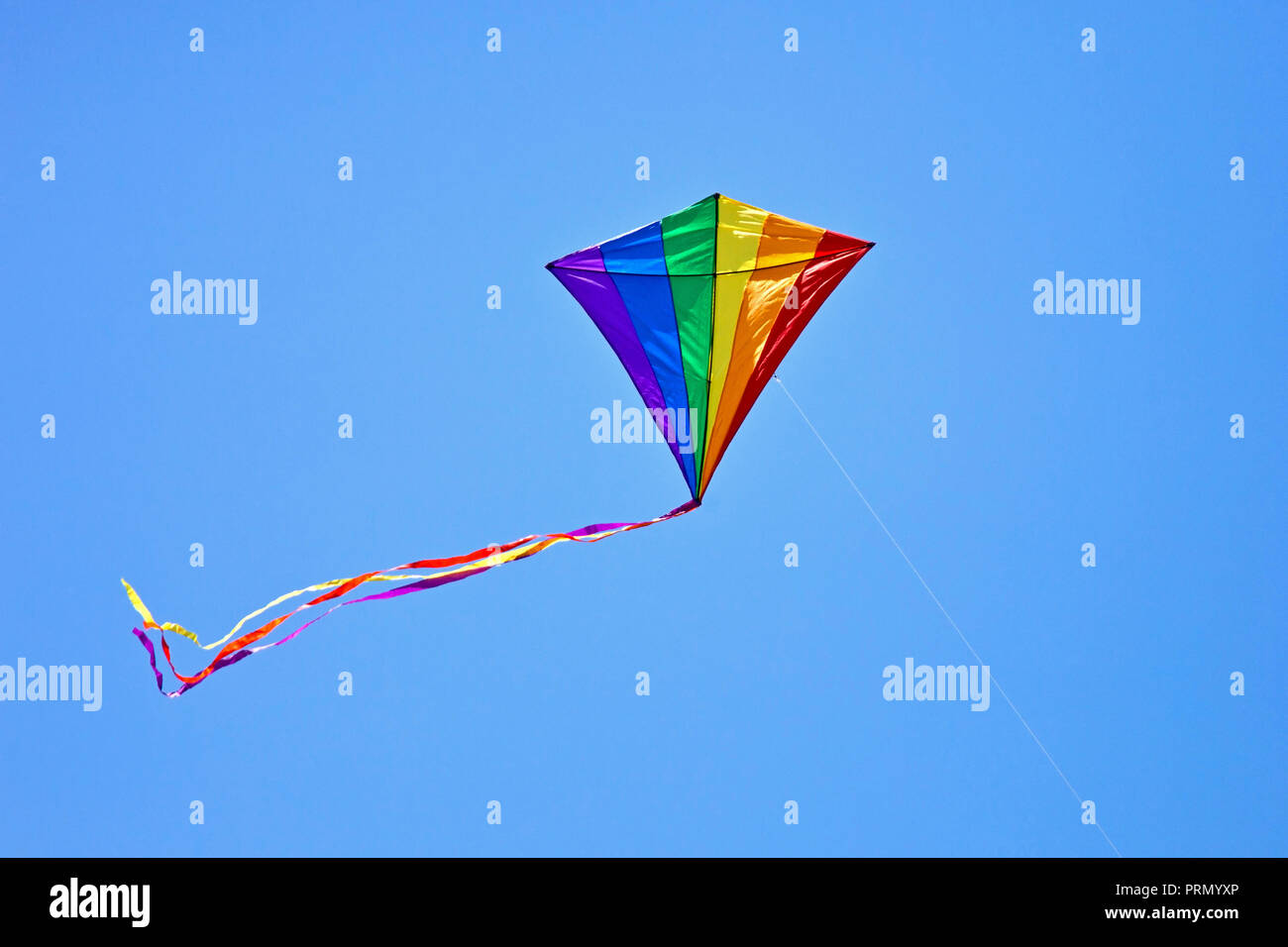 kite flying in the blue sky Stock Photo - Alamy
