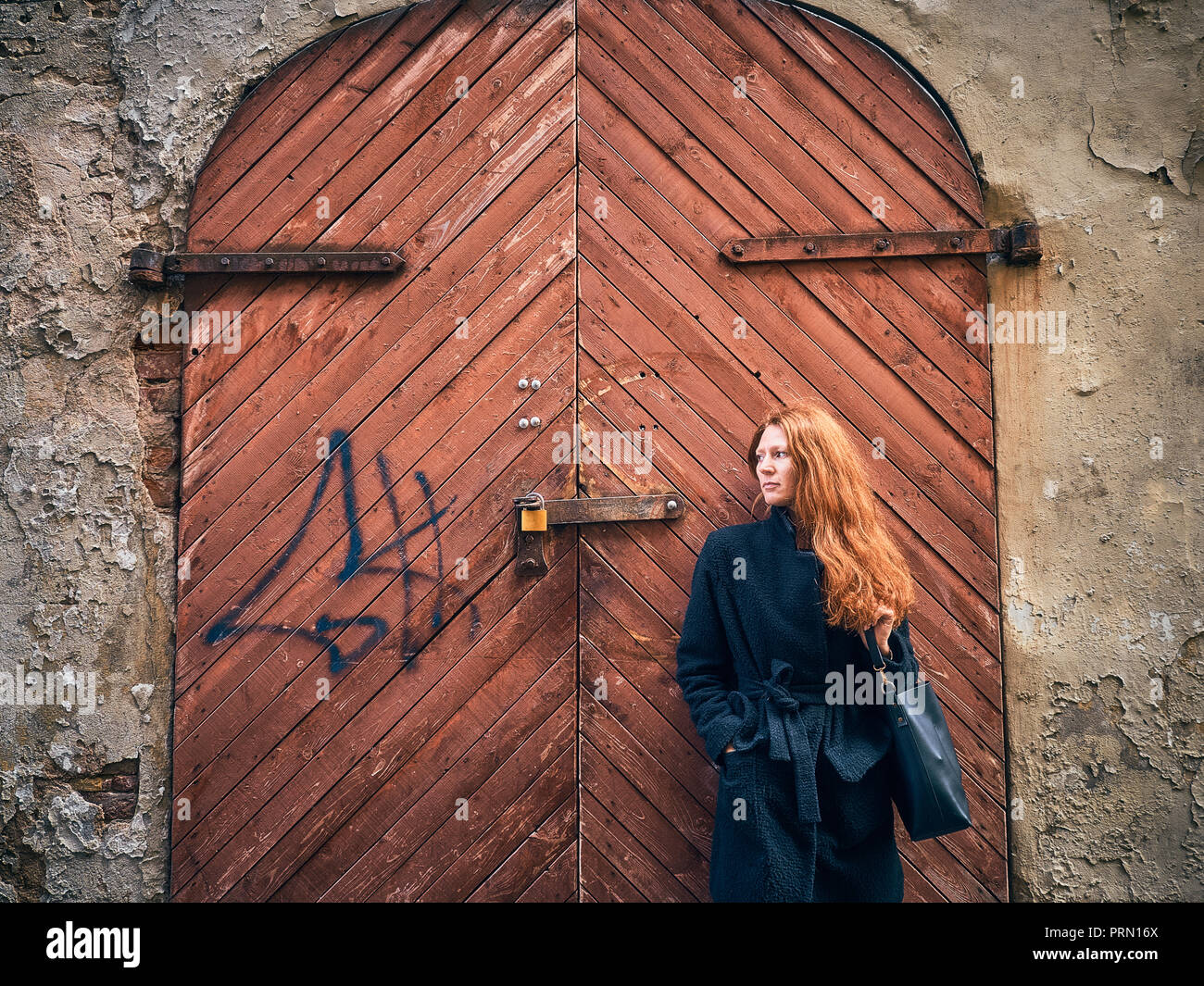 Girl by wooden gate hi-res stock photography and images - Alamy