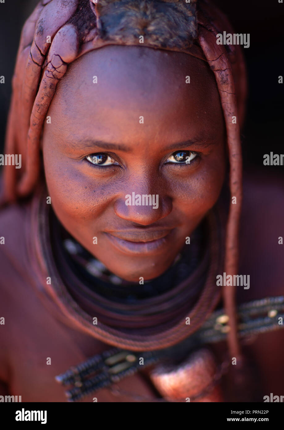 Portrait of a Himba tribe woman covered with otjize, Cunene Province ...