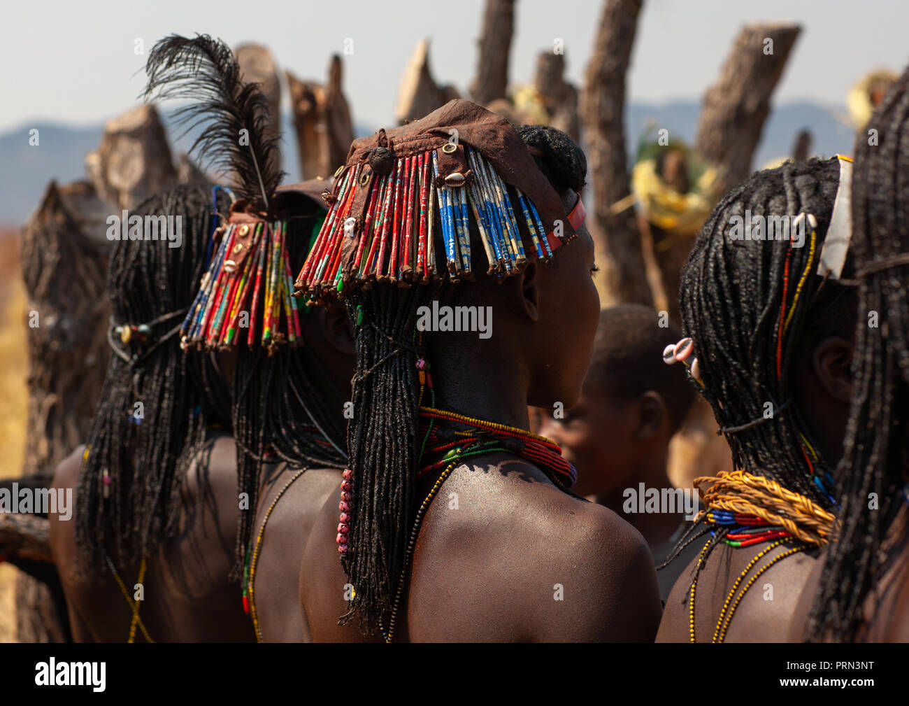 Muhacaona tribe women with kapapo headdress made of soda cans, Cunene ...