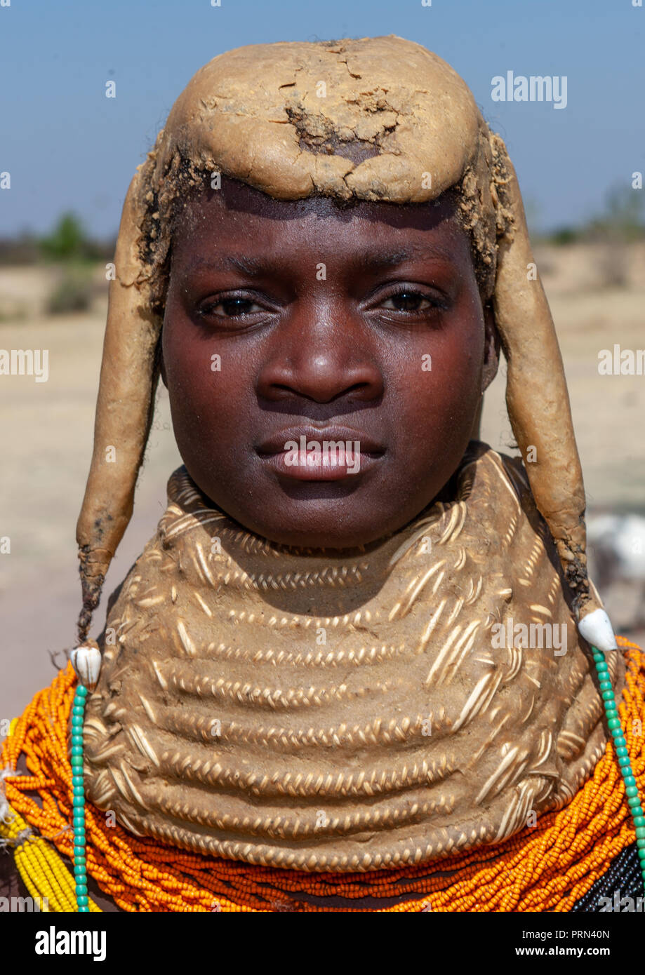 Portrait of a Mumuhuila tribe woman portrait wearing a huge necklace ...