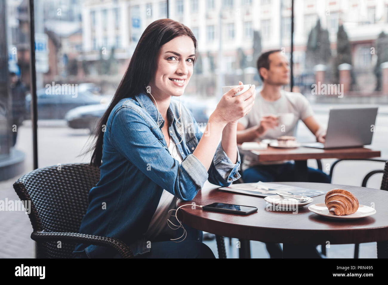 Beautiful girl looking straight at camera Stock Photo - Alamy