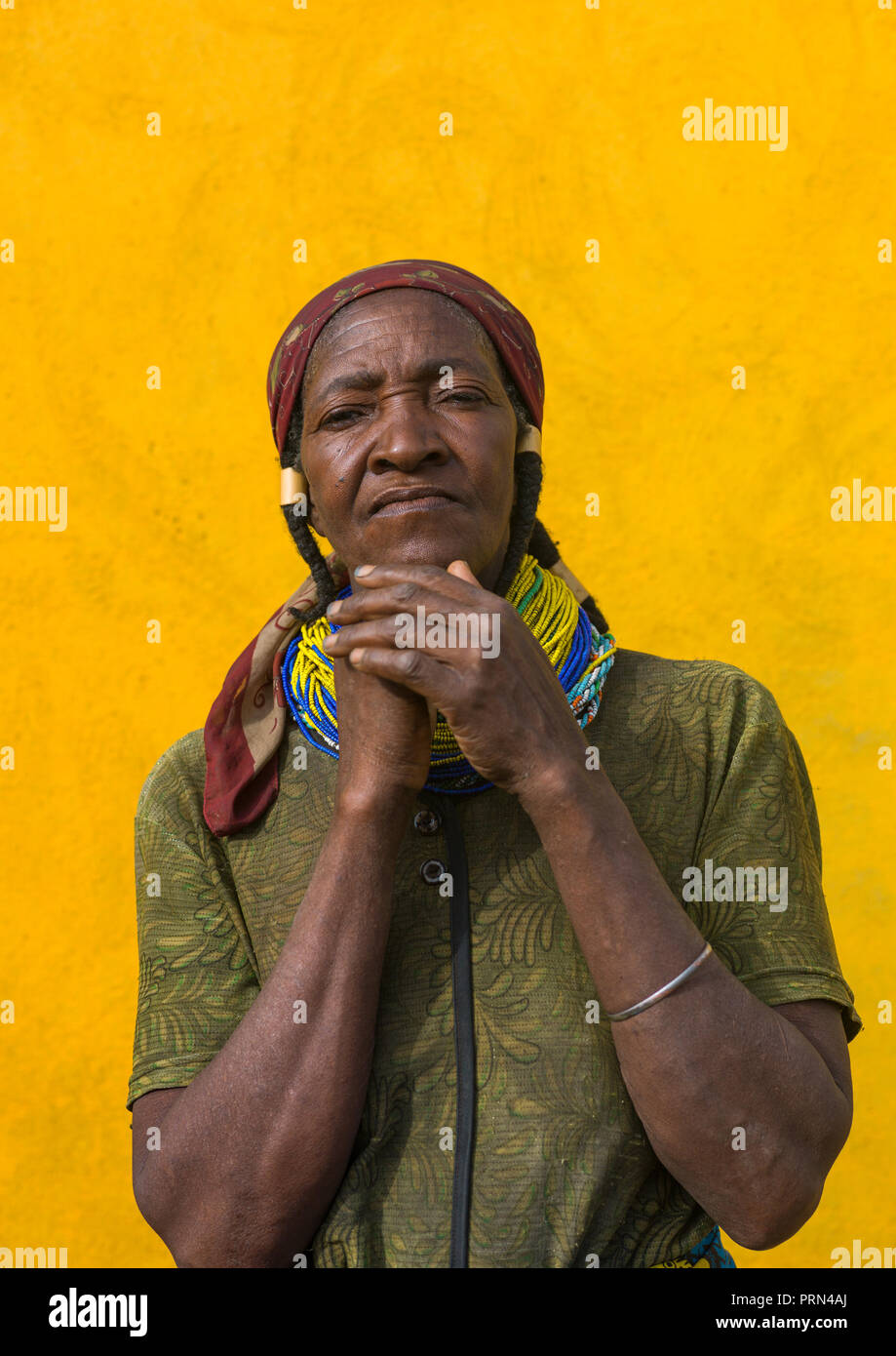 Mumuhuila tribe woman portrait dressed in western clothes, Huila ...