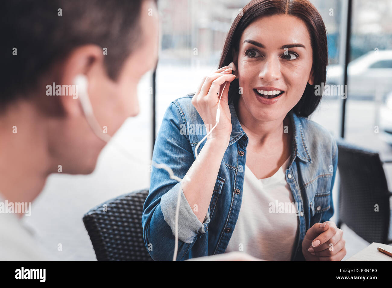 Surprised female person staring at her partner Stock Photo - Alamy