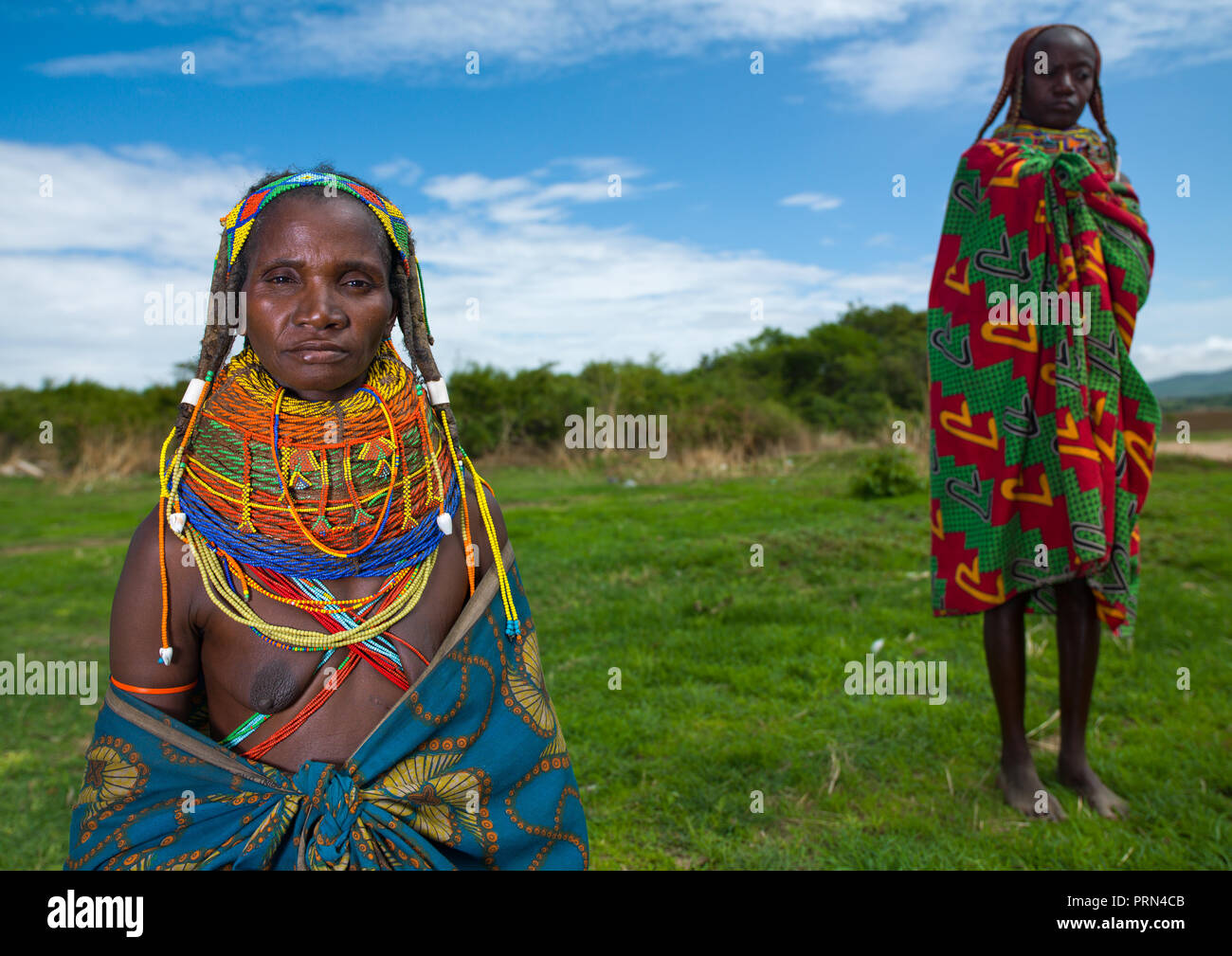 Mumuhuila tribe women in a field, Huila Province, Chibia, Angola Stock ...