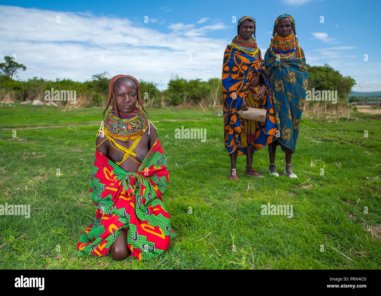 Mumuhuila tribe women in a field, Huila Province, Chibia, Angola Stock ...