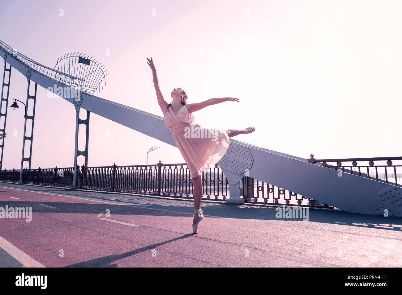 One leg arabesque hi-res stock photography and images - Alamy