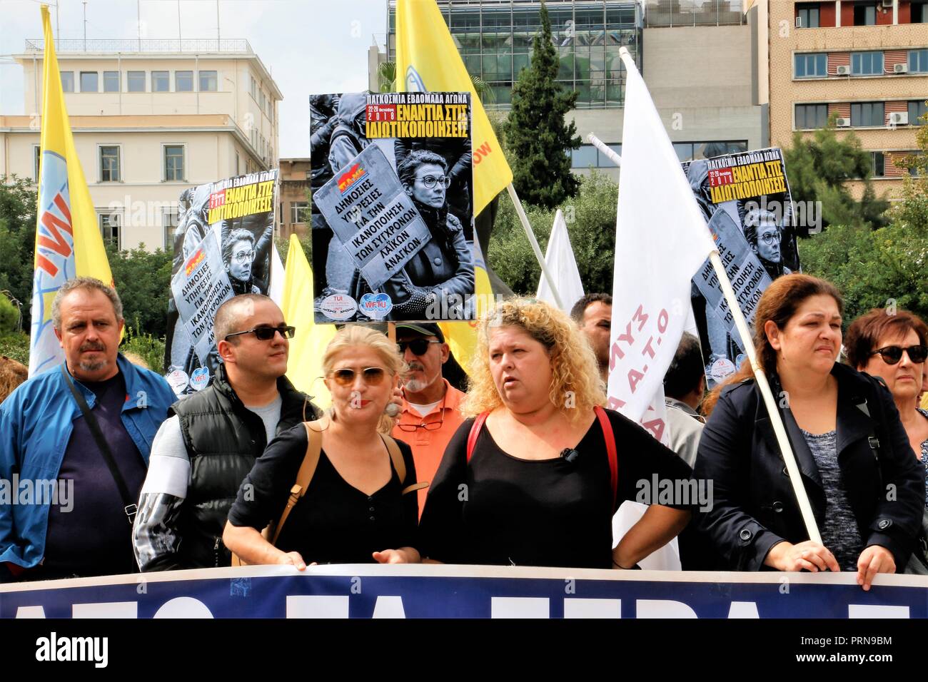 Athens, Greece. 3rd Oct, 2018. Protesters are seen standing holding ...