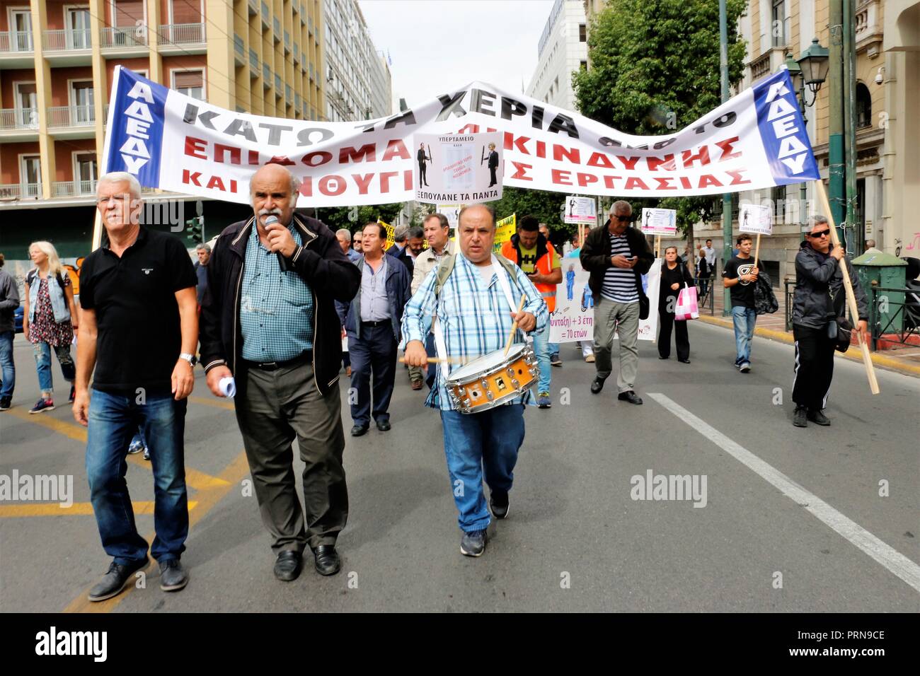 Athens, Greece. 3rd Oct, 2018. Protesters are seen walking holding a ...
