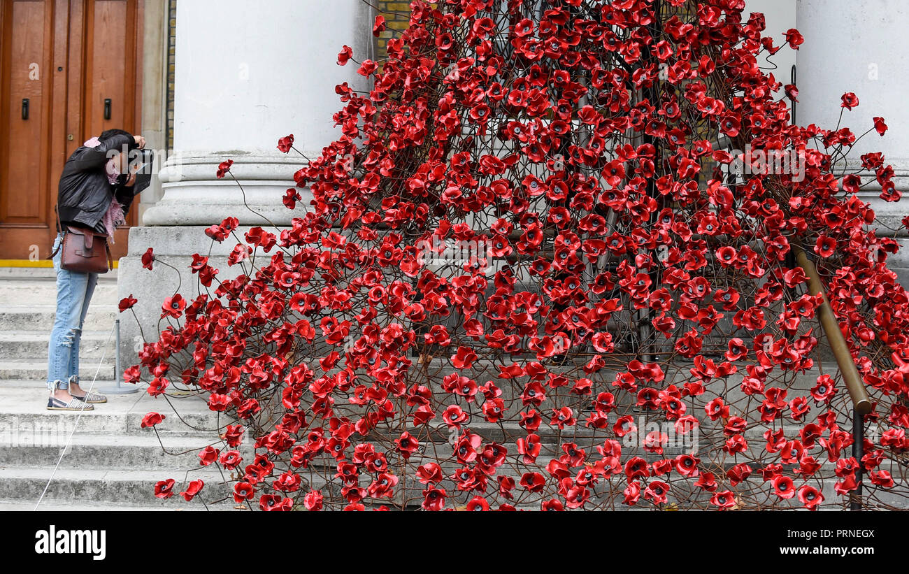 London, UK. 4 October 2018. A visitor photographs "Weeping Window", the ...
