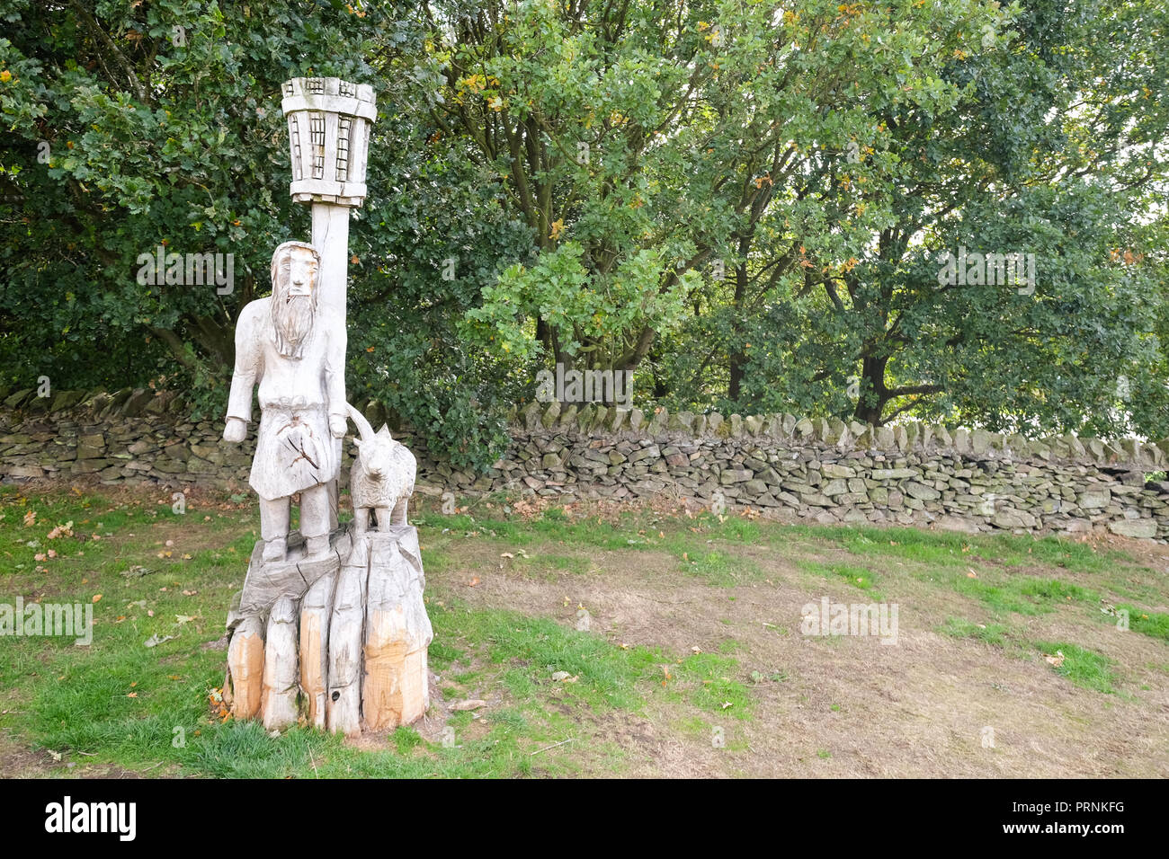 carved wooden statue at beacon hill leicestershire Stock Photo - Alamy
